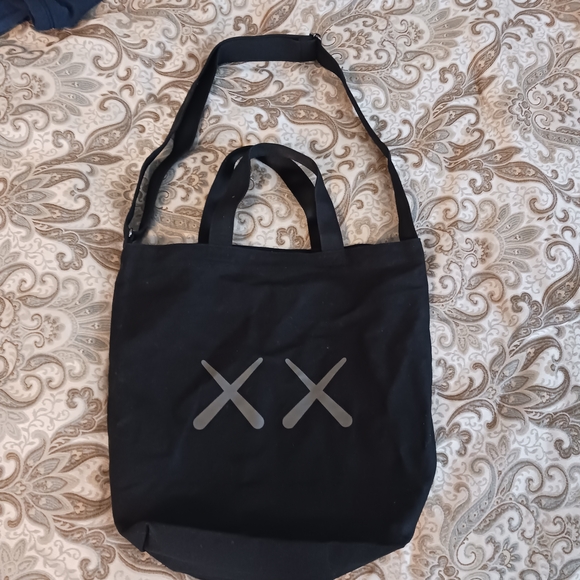 KAWS | Bags | Kaws X Uniqlo Black Messenger Bag With Cross Design ...